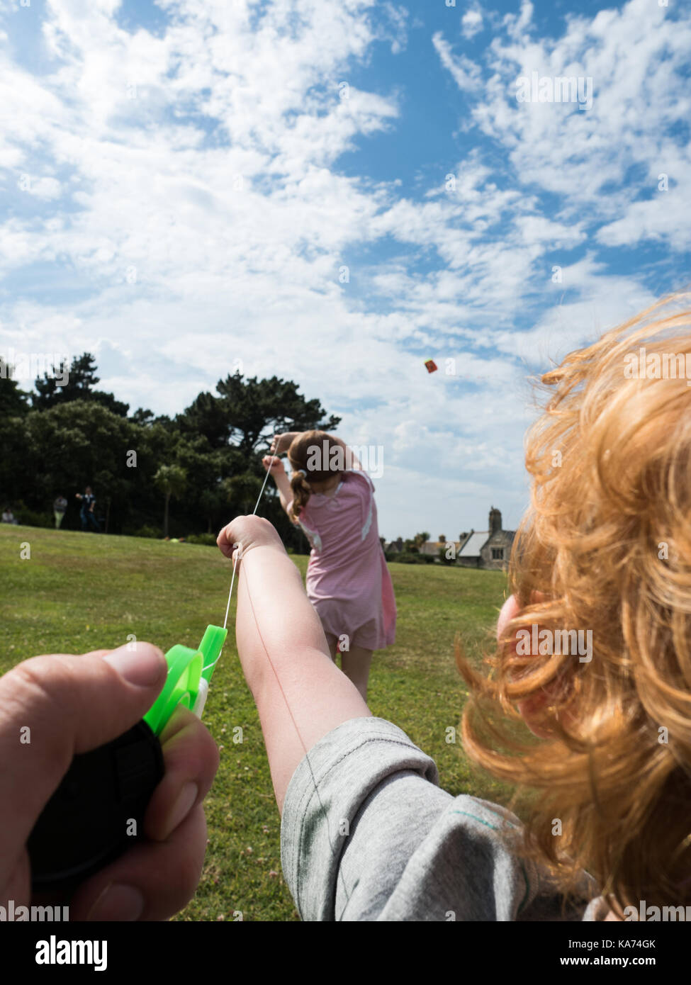 Kid flying kite hi-res stock photography and images - Alamy