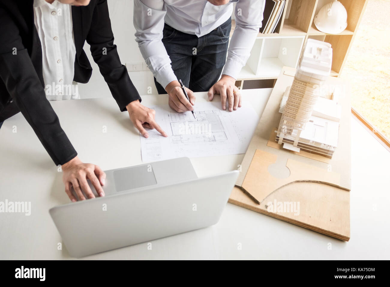 Person's engineer Hand Drawing Plan On Blue Print with architect ...