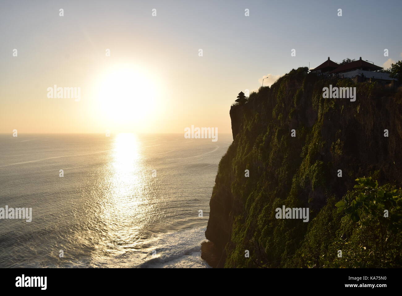 Sunset at Uluwatu hindu temple in Bali, Indonesia Stock Photo - Alamy