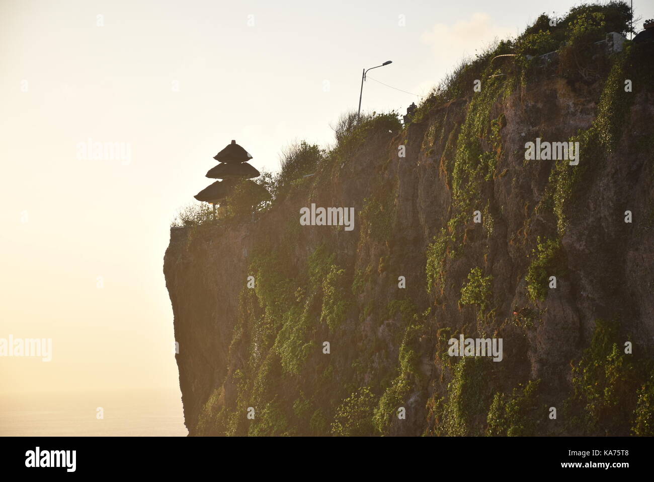 Sunset at Uluwatu hindu temple in Bali, Indonesia Stock Photo - Alamy