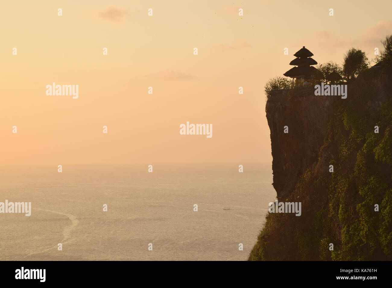 Sunset at Uluwatu hindu temple in Bali, Indonesia Stock Photo - Alamy