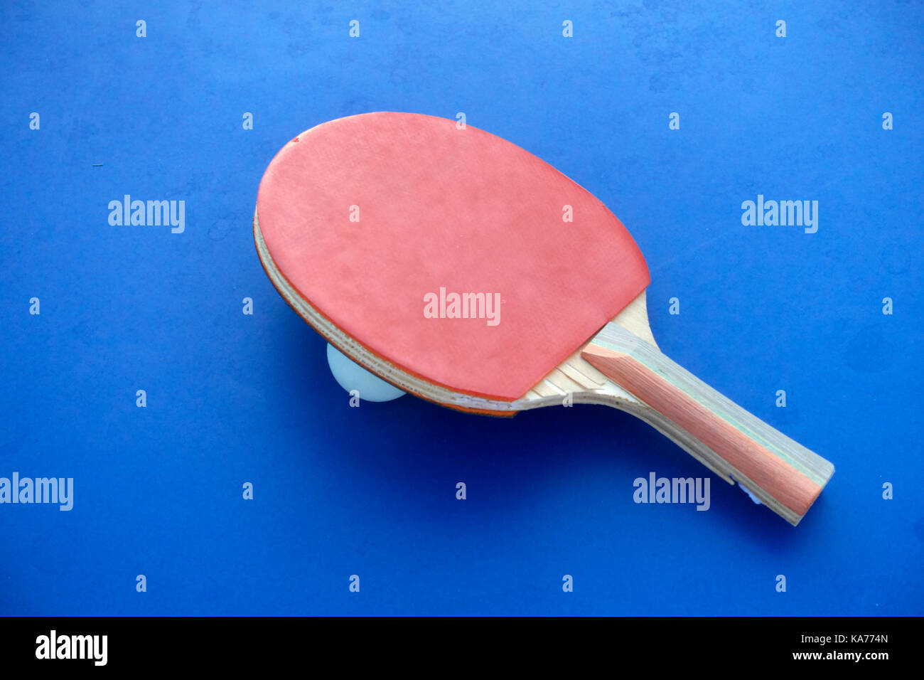 Ping pong racket on a table Stock Photo - Alamy
