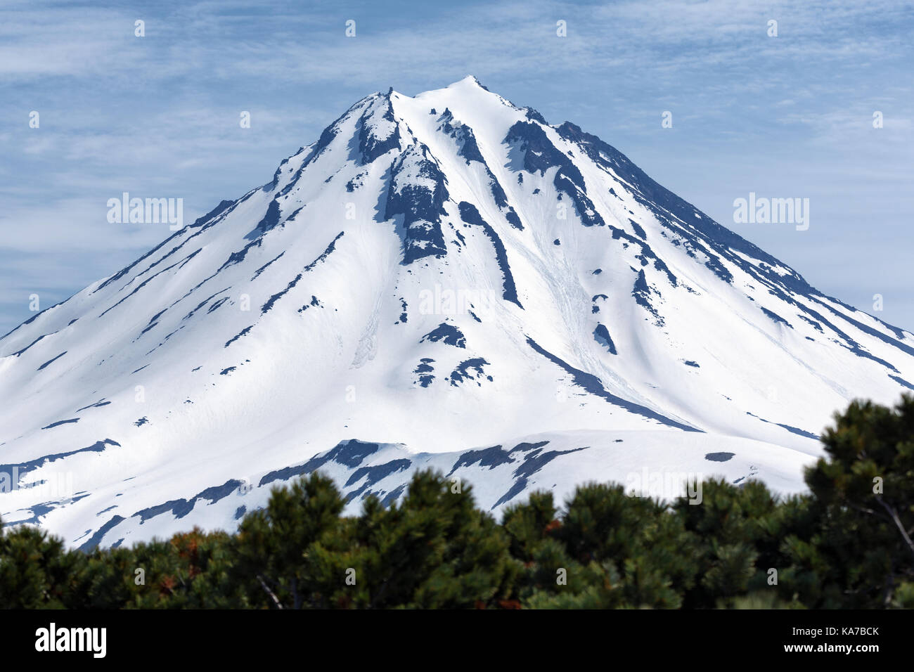 Kamchatka Peninsula volcanic landscape: beautiful view of snowy cone of ...