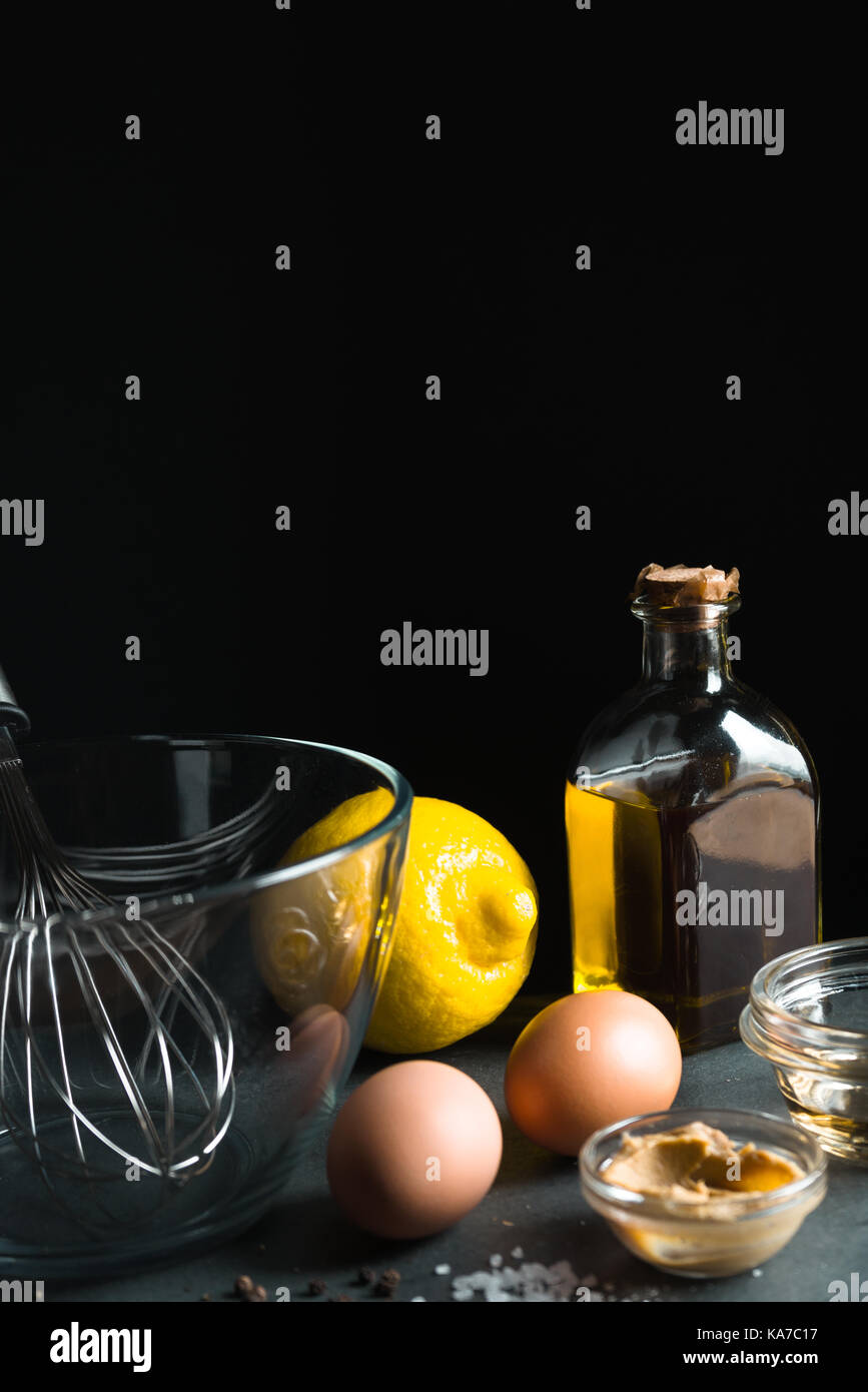 Ingredients for cooking homemade mayonnaise side view vertical Stock ...