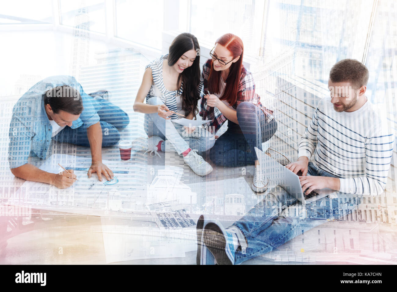 Clever engineers working on new start up Stock Photo - Alamy
