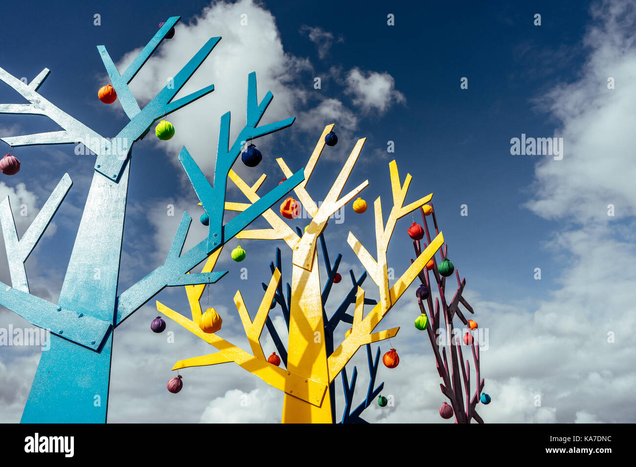 Abstract tree shape on a dark blue sky background with clouds close-up ...