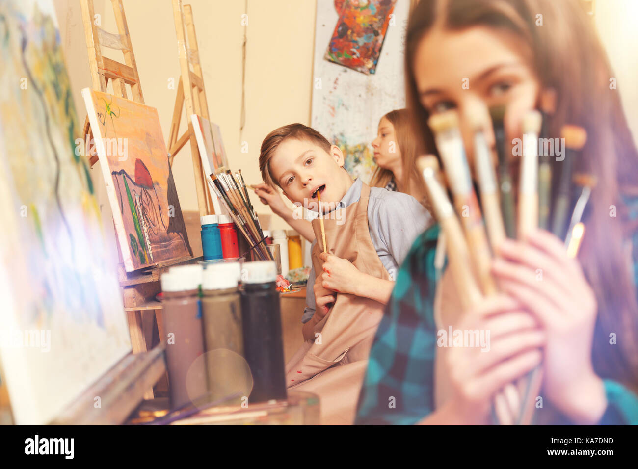 Children having fun during painting session in studio Stock Photo - Alamy