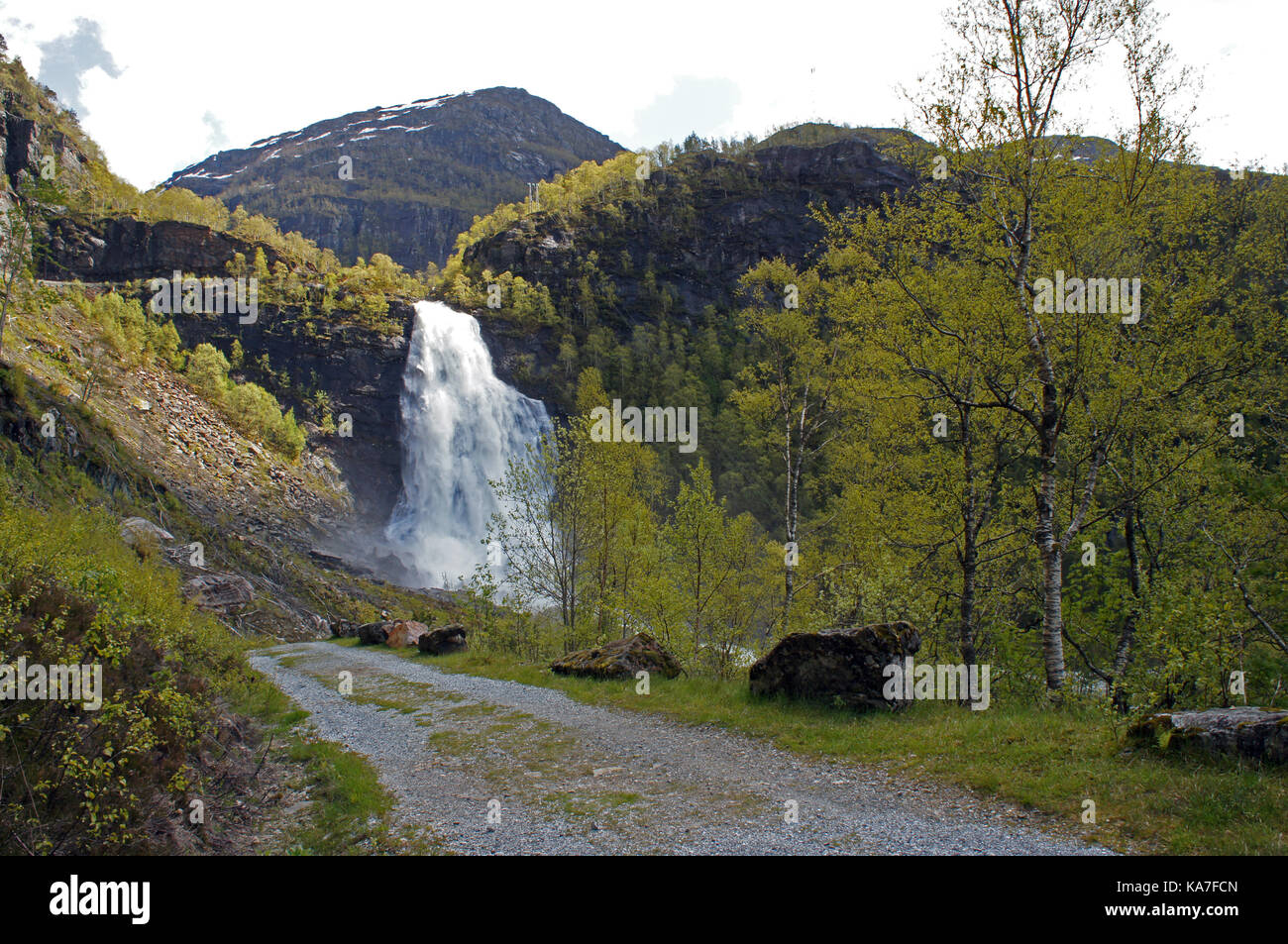 Fossen Bratte waterfall in Samnanger, Hordaland, Norway surrounded by ...