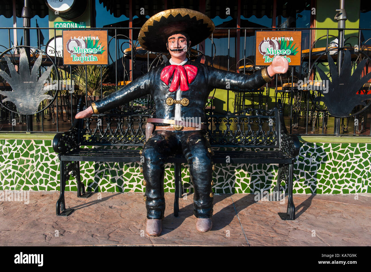 Mexican figure on a bank, Los Cabos, Baja California, Mexico Stock ...