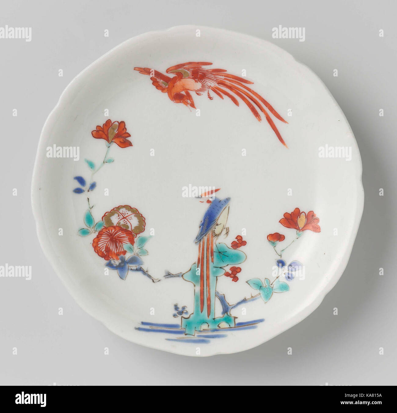 Scalloped saucer with hoo birds Stock Photo - Alamy
