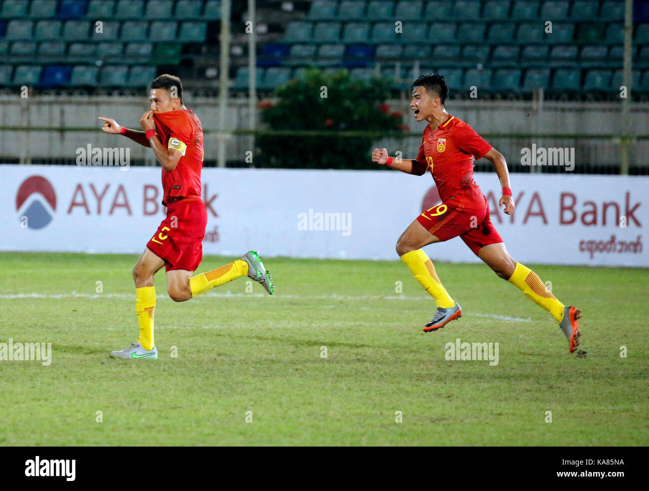 Yangon, Myanmar. 25th Sep, 2017. Subi Abulimiti (L) of China celebrates ...