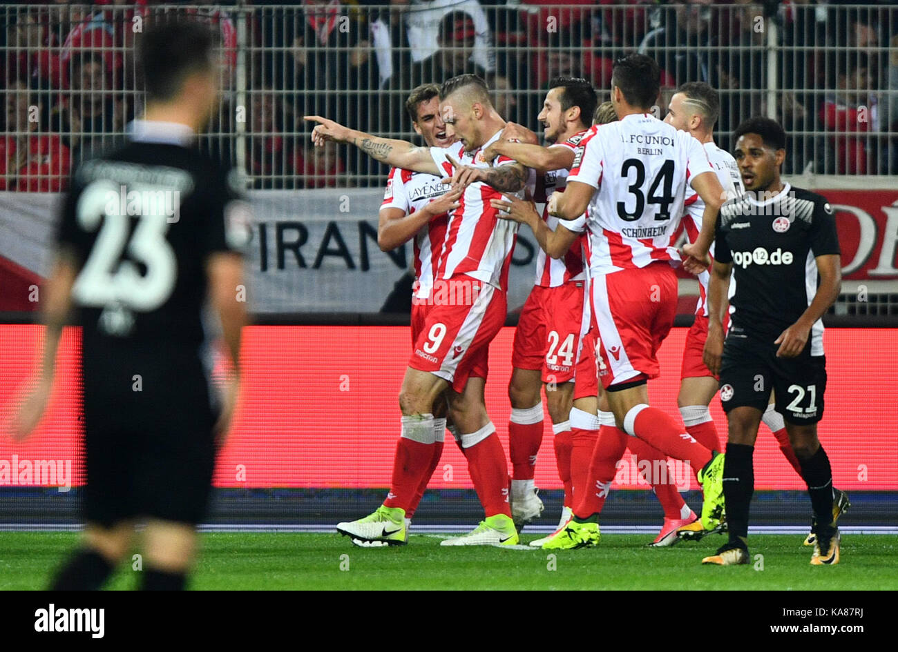 Berlin's players celebrate Sebastian Polter's (2-L) goal for a 3:0 lead ...