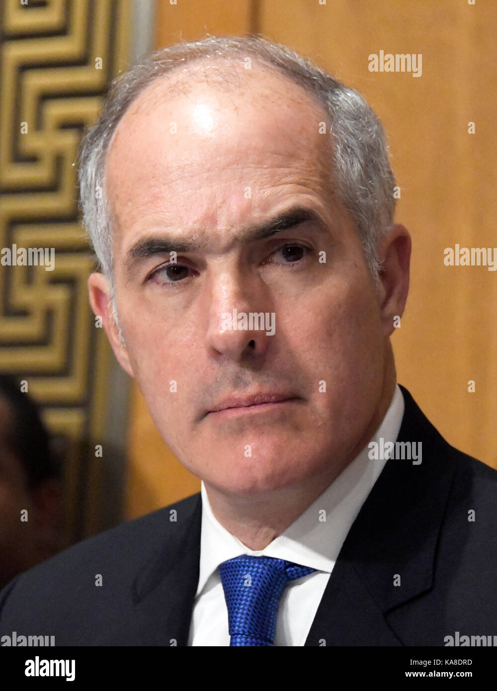 United States Senator Bob Casey (Democrat of Pennsylvania) listens ...