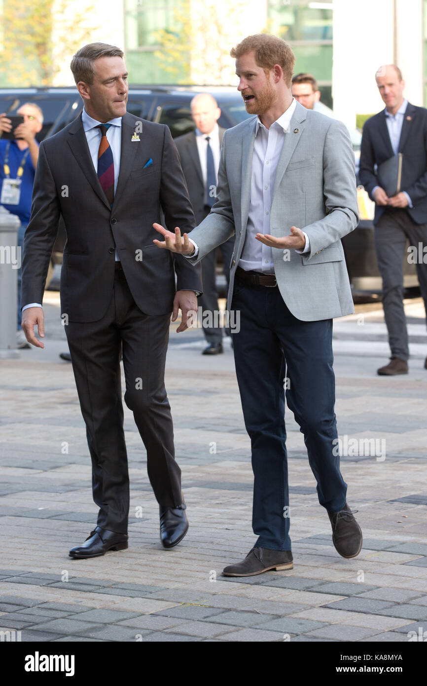 Prince Harry, with Michael Burns, CEO of the Invictus Games, arriving ...