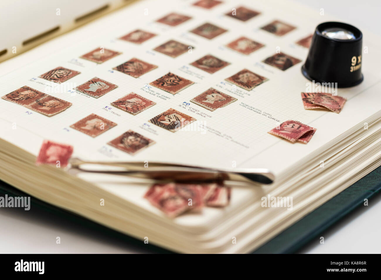 England. Victoria penny red stamps with annotations in stamp album and ...