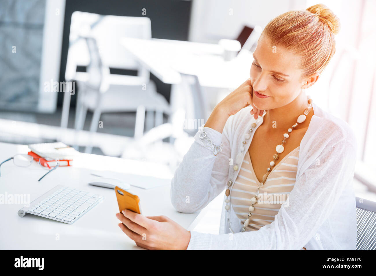 Elegant office worker Stock Photo - Alamy