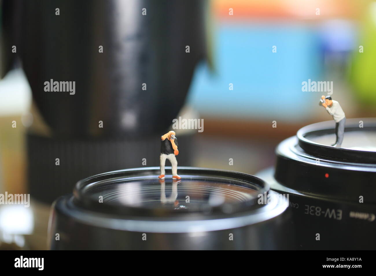 tiny man take photo Stock Photo - Alamy