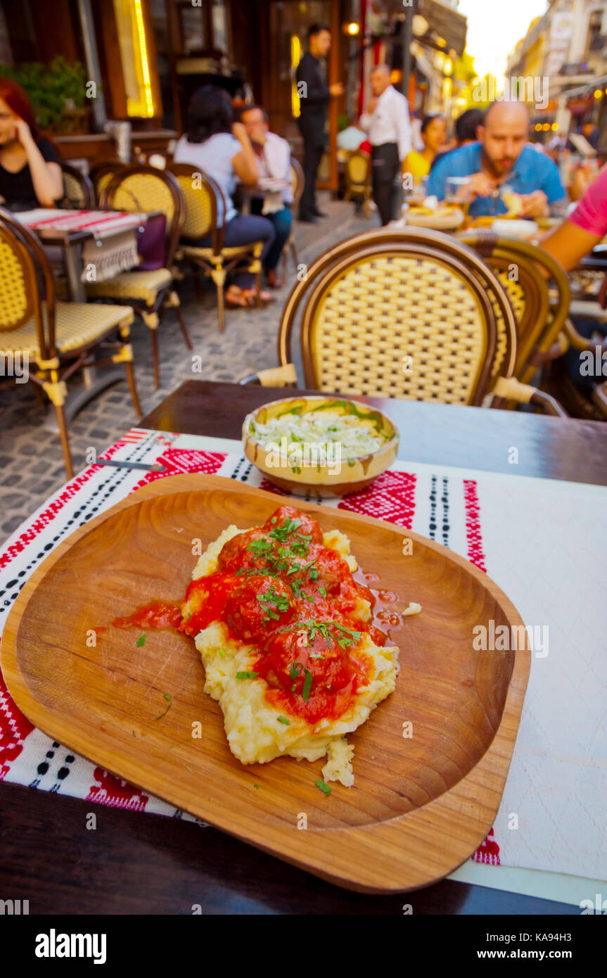 Traditional Romanian meal of meatballs with tomato sauce and mashed ...