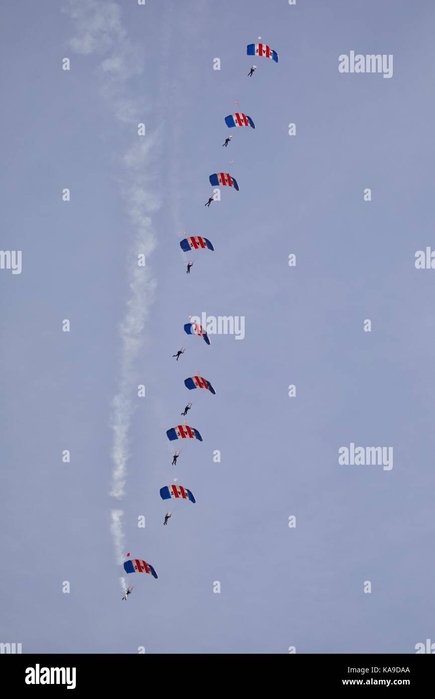 The RAF Falcons Parachute Display Team performing at Duxford Battle of ...