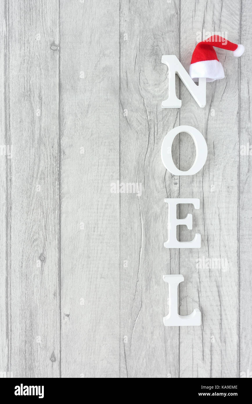 Christmas background with the words noel formed out of white wooden ...