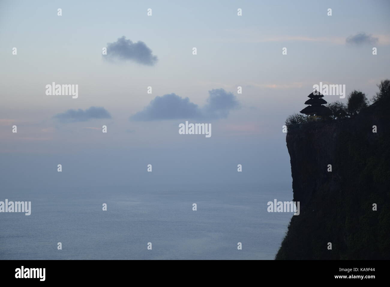 Sunset at Uluwatu hindu temple in Bali, Indonesia Stock Photo - Alamy