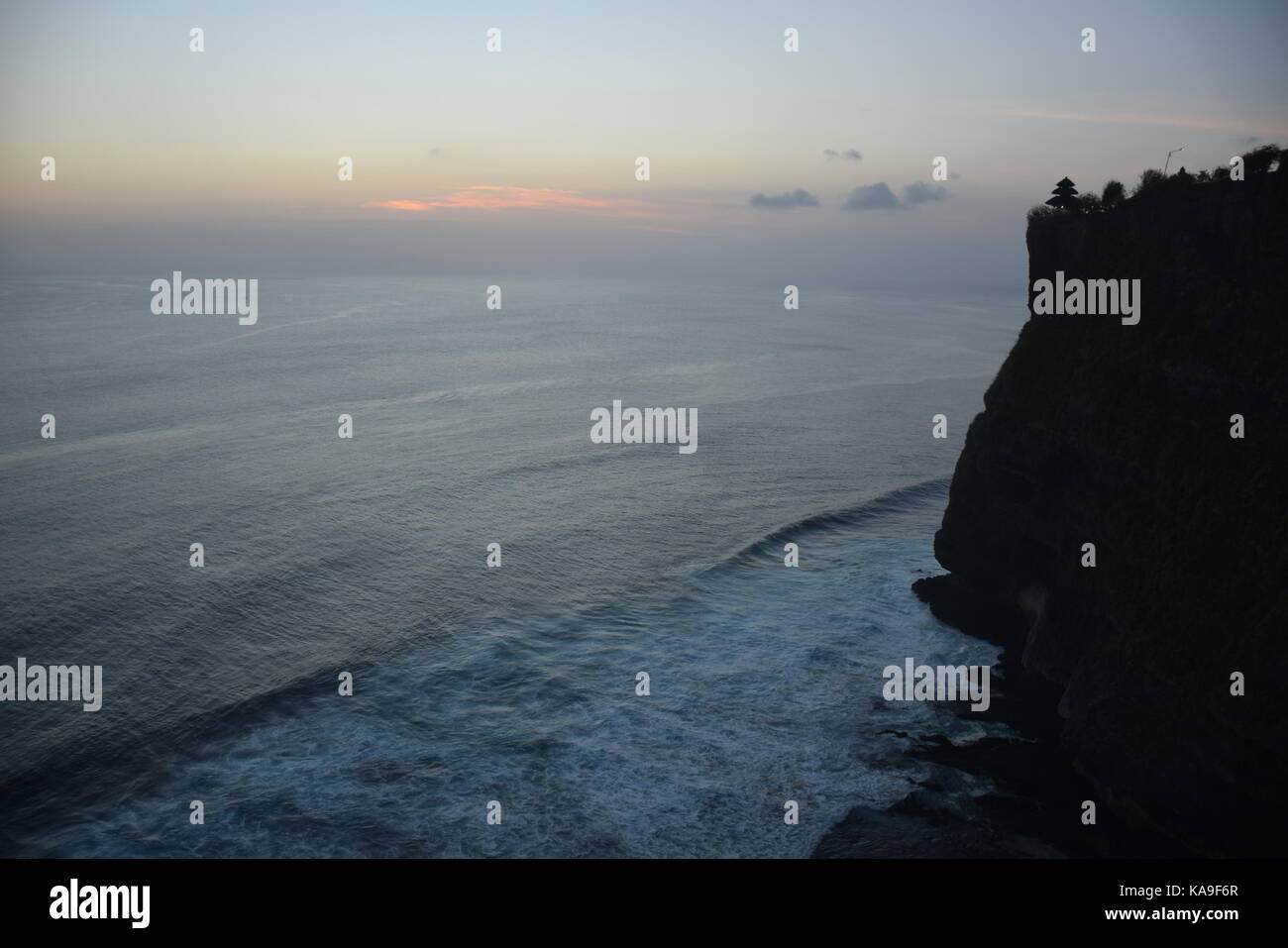 Sunset at Uluwatu hindu temple in Bali, Indonesia Stock Photo - Alamy