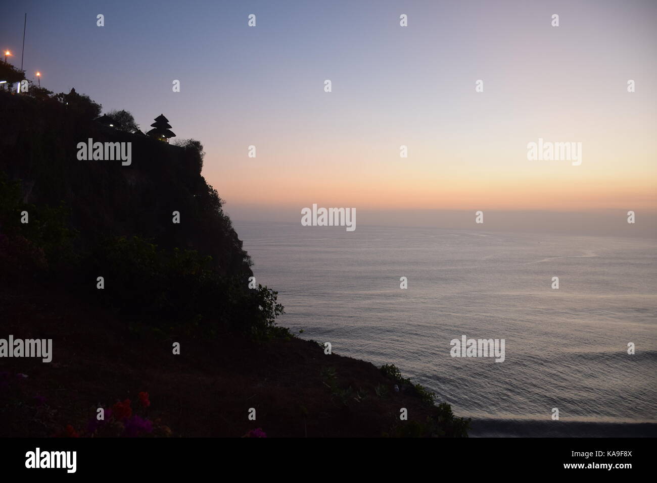 Sunset at Uluwatu hindu temple in Bali, Indonesia Stock Photo - Alamy