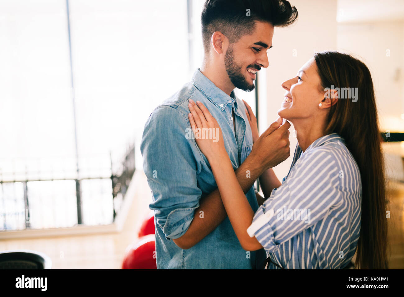 Beautiful couple hugging Stock Photo - Alamy