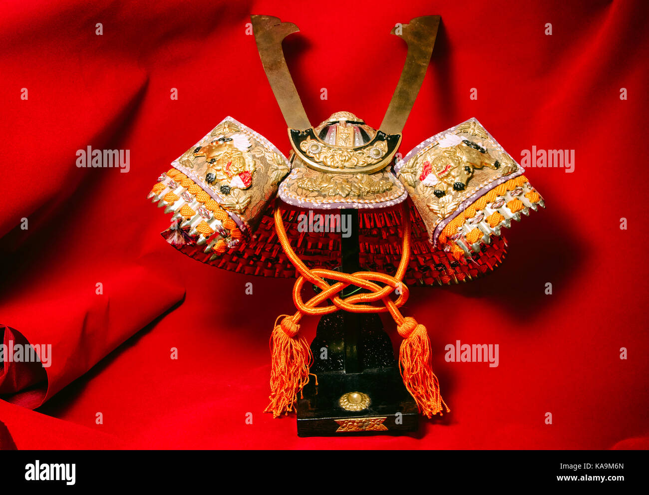 Samurai armor isolate on red background Stock Photo - Alamy