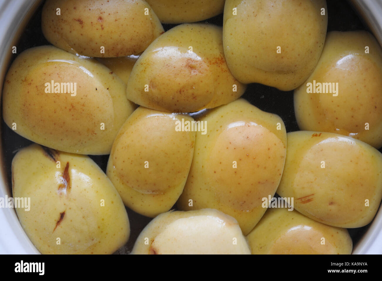 Fresh cooked apple compote in the pan Stock Photo - Alamy