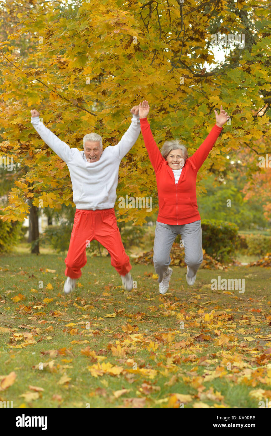 senior couple jumping Stock Photo - Alamy