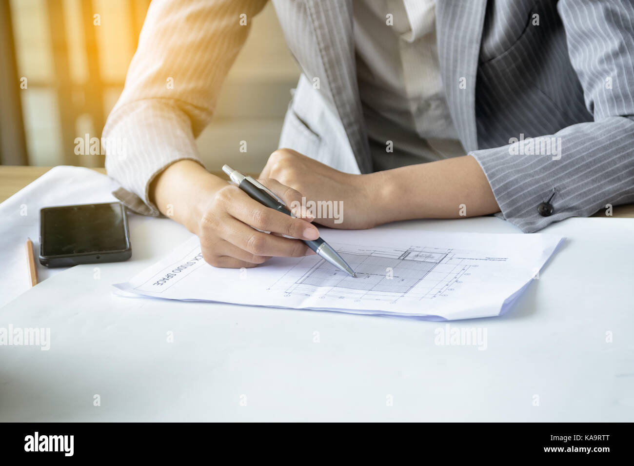 Hands of architect engineer meeting and discussing plan for ...
