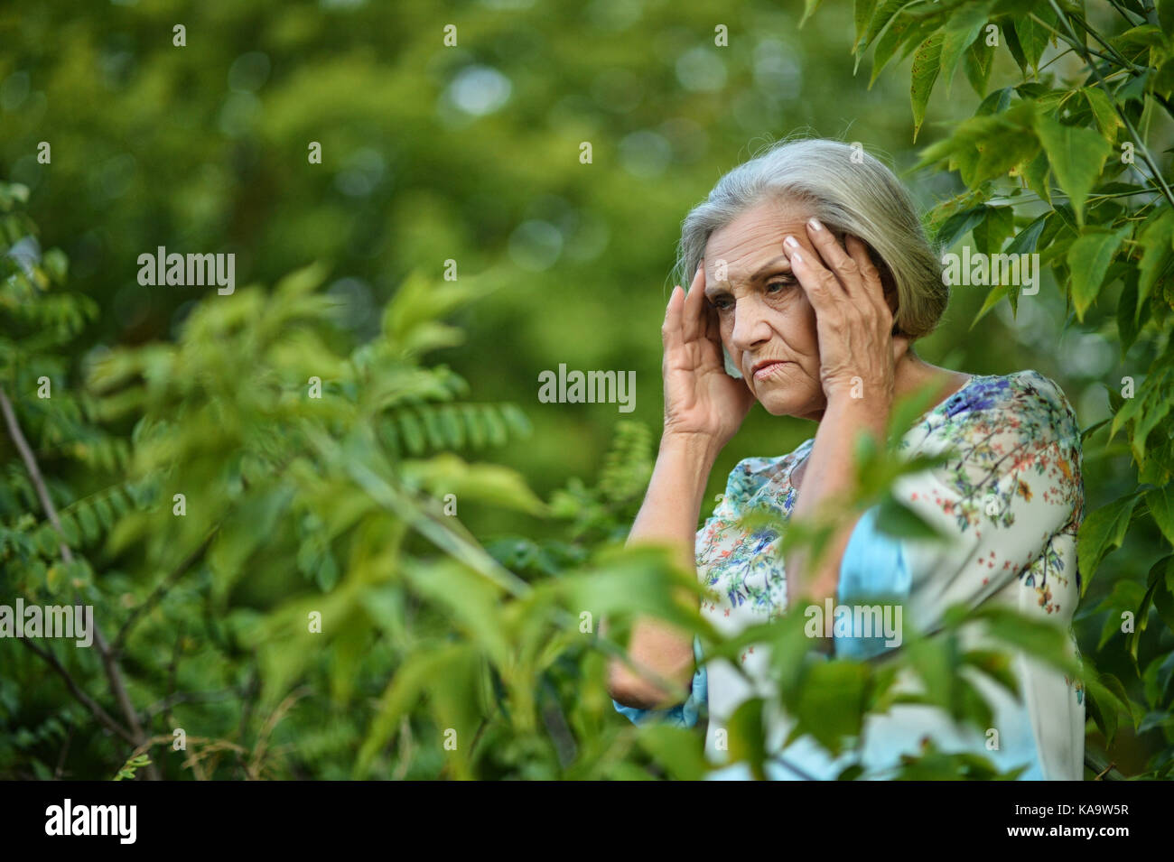 Nice sad old woman Stock Photo - Alamy