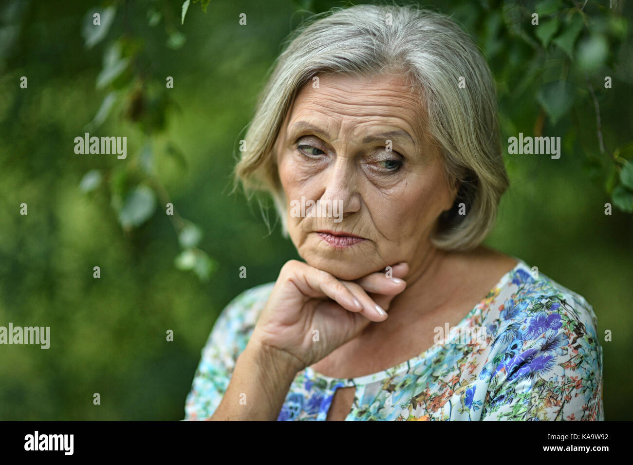 Nice sad old woman Stock Photo - Alamy