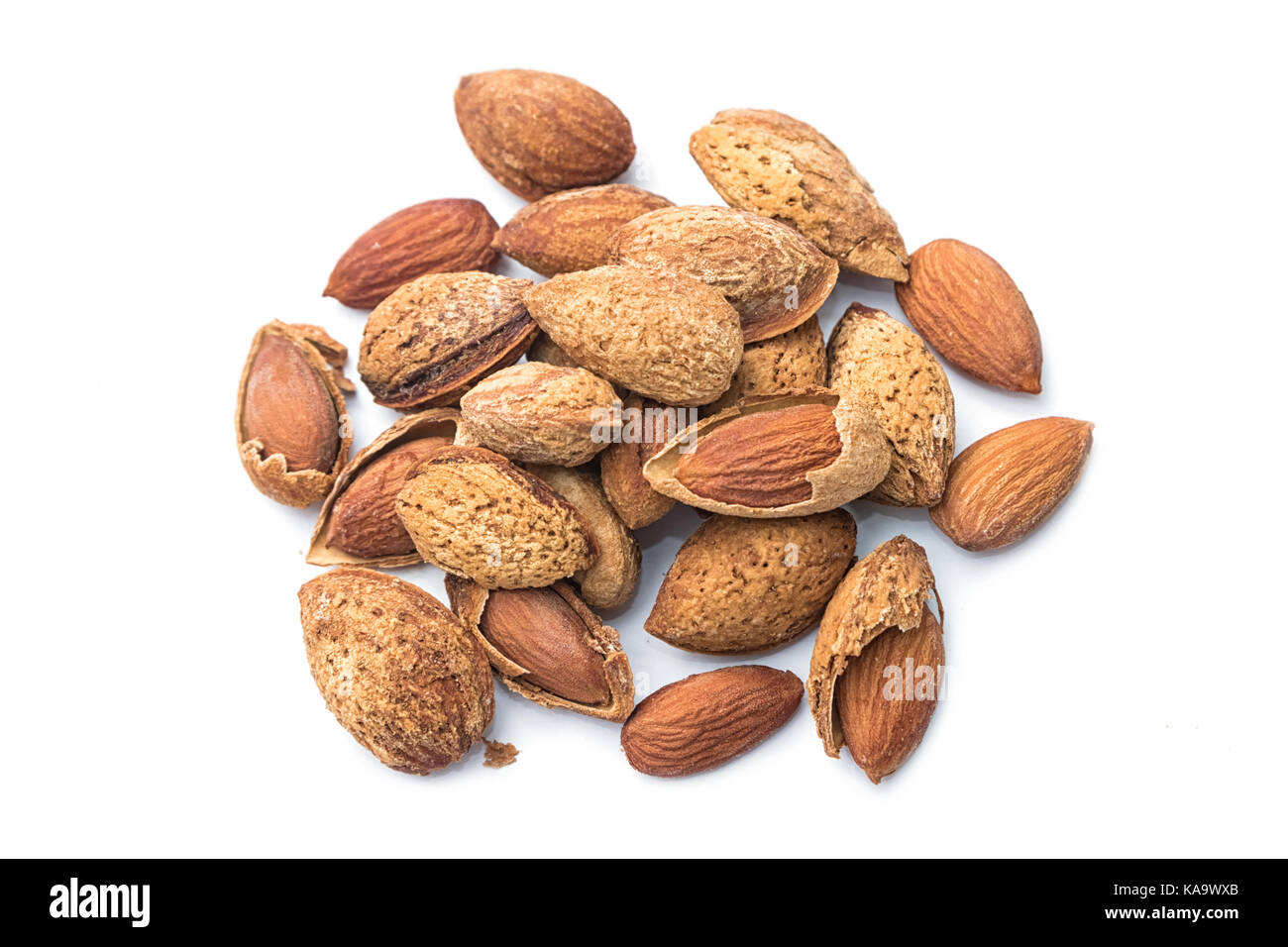 Pile of almonds isolated on white background Stock Photo - Alamy