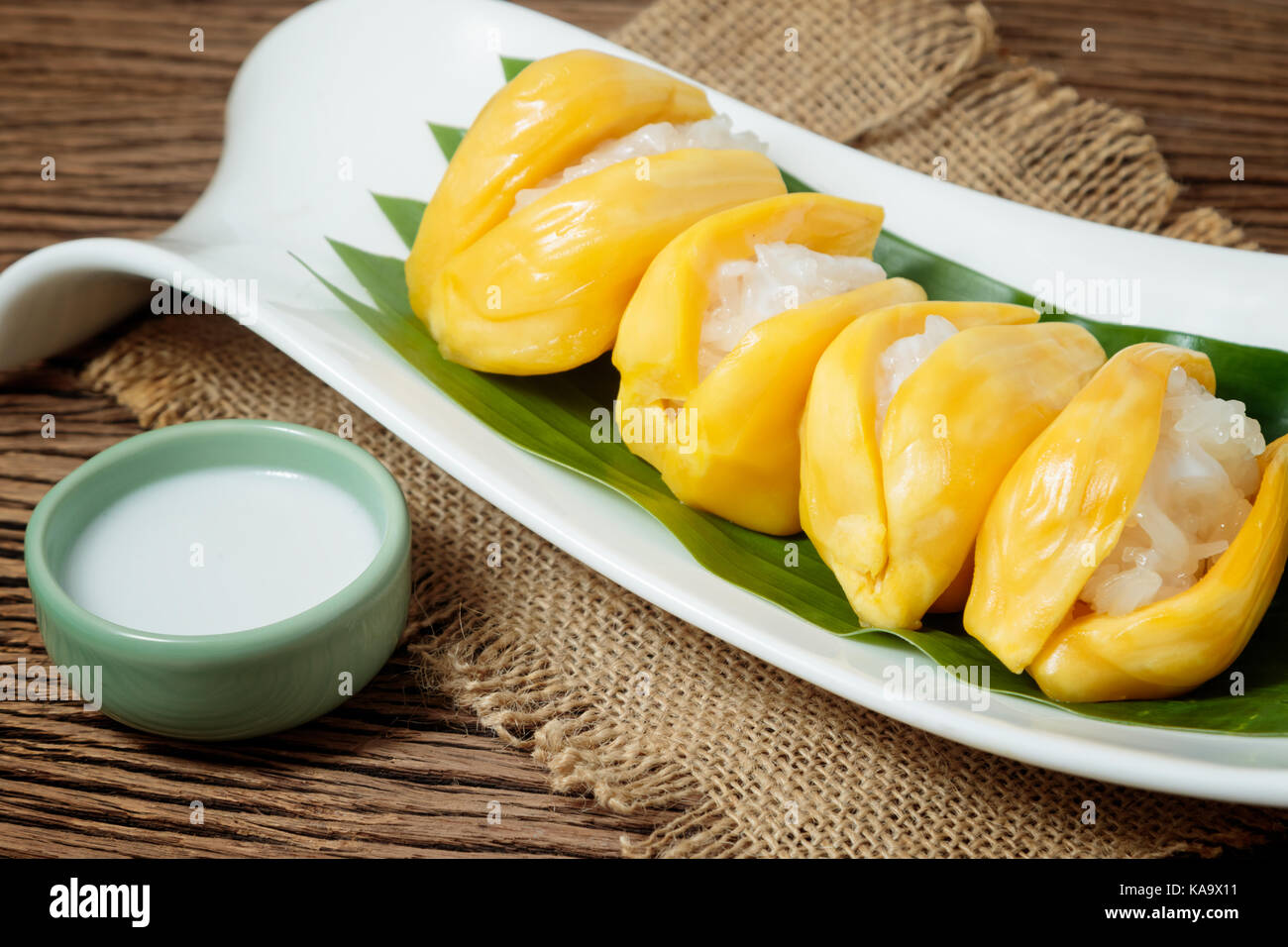 Thai style dessert, sticky rice in jack fruit Stock Photo - Alamy