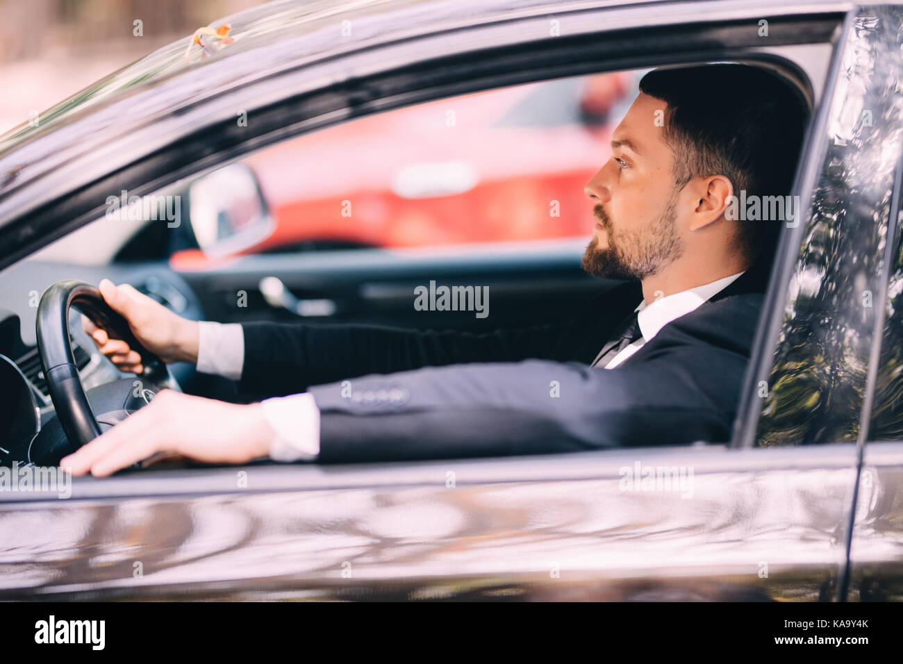 Indian businessman driving a car hi-res stock photography and images ...