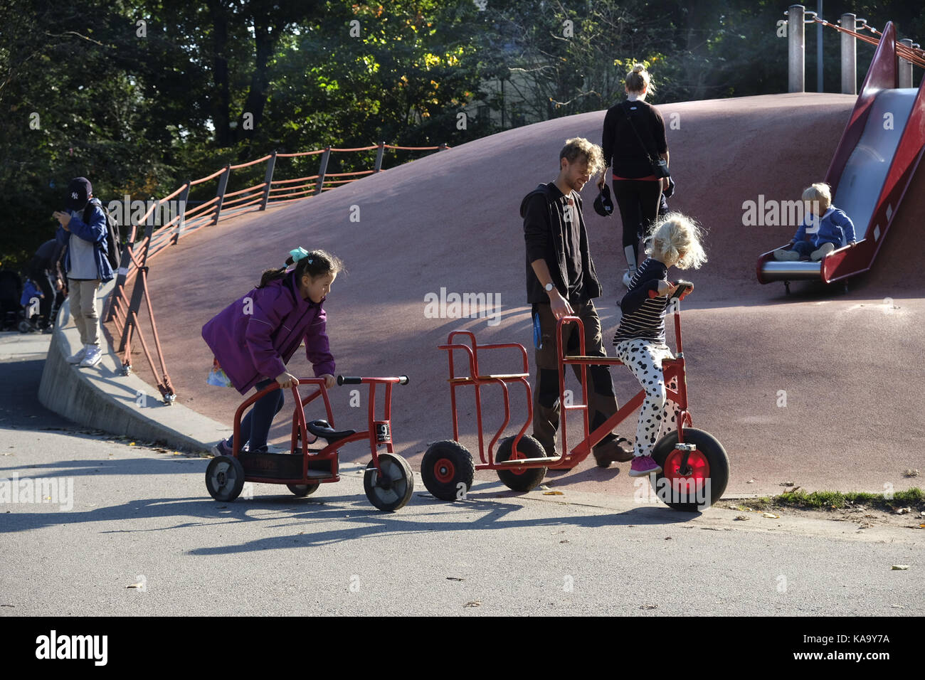 Children in a playground in Vasaparken in Stockholm Stock Photo - Alamy