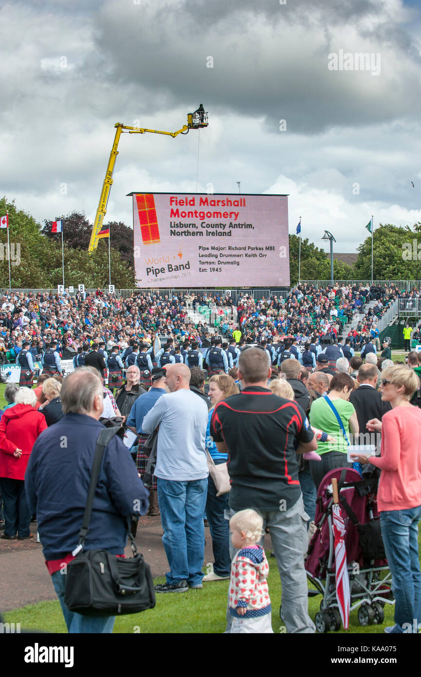Crowds of spectators watching Field Marshal Montgomery Pipe Band at the ...