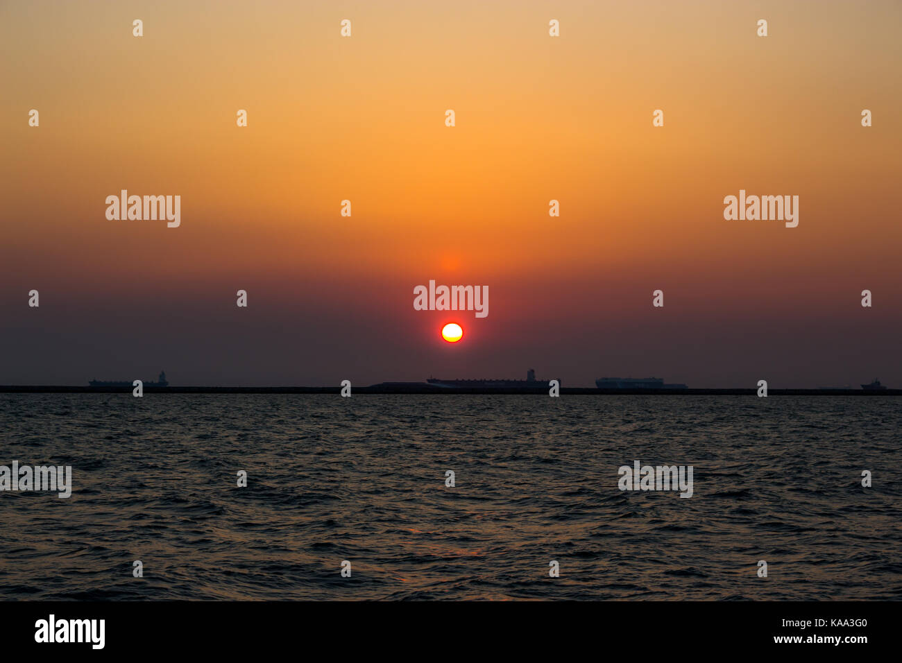 Sea evening sunset Stock Photo - Alamy