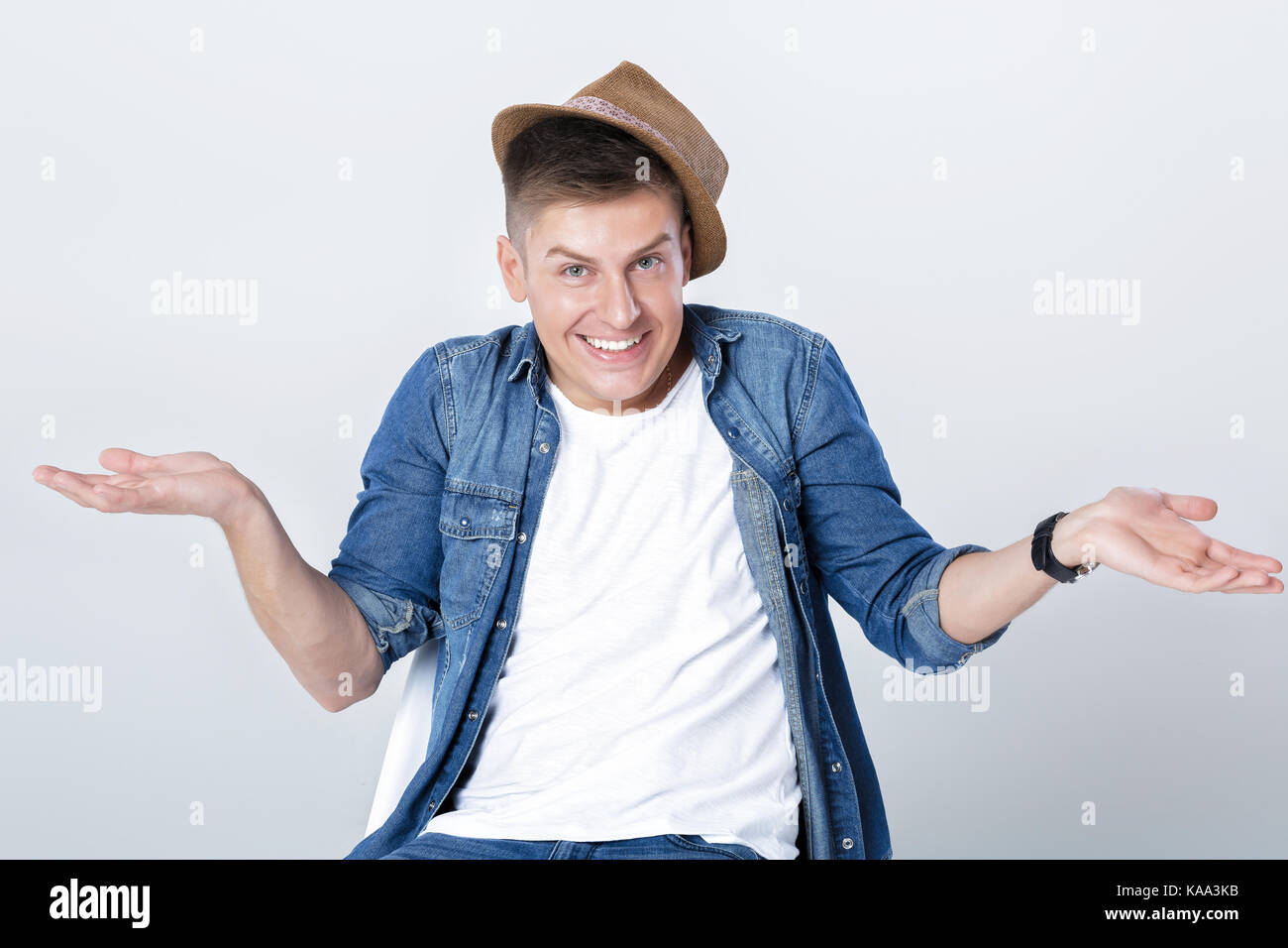 handsome man in denim with hat Stock Photo - Alamy