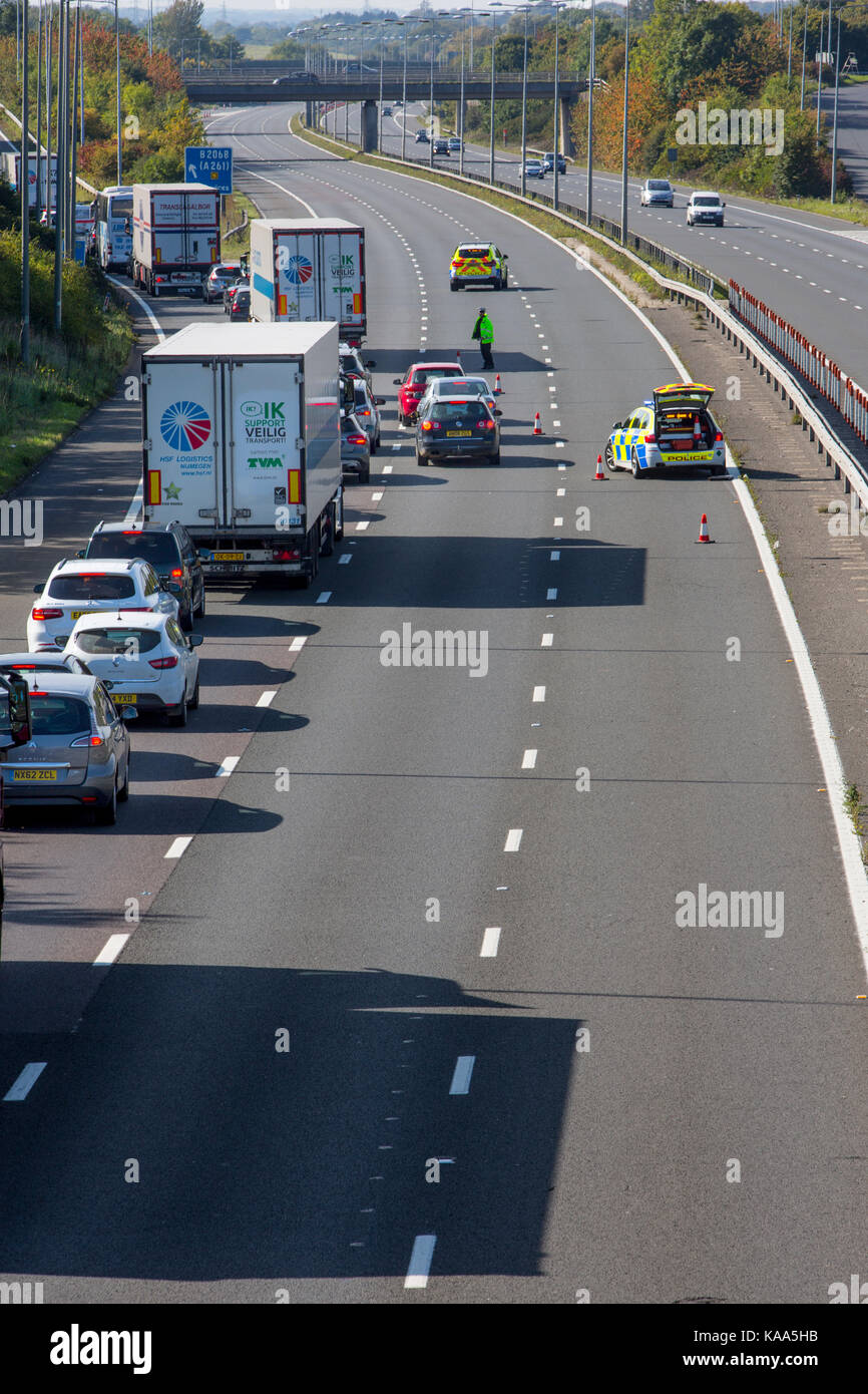 Police closing a motorway Stock Photo - Alamy