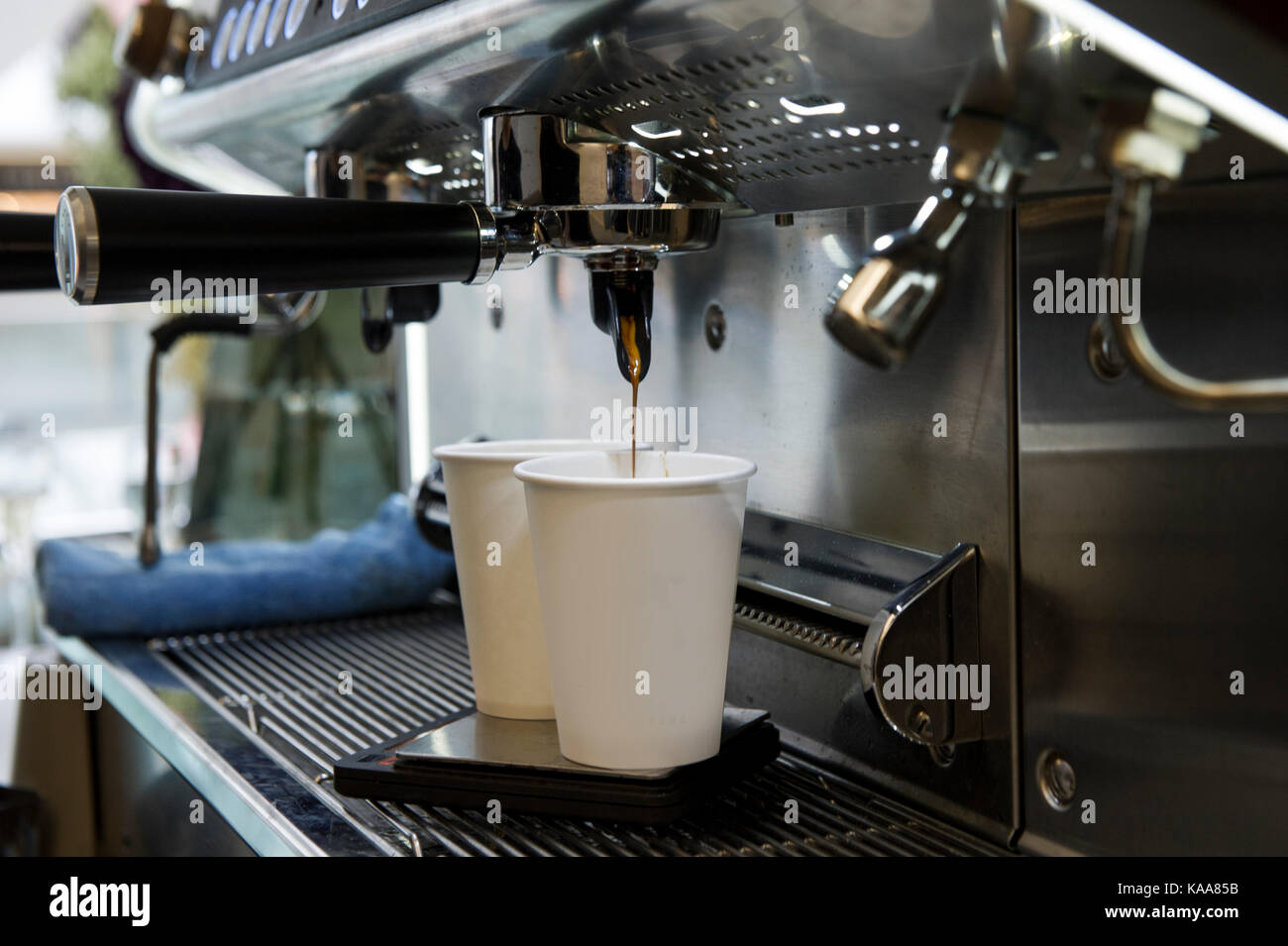 An industrial coffee machine prepares a morning coffee Stock Photo - Alamy