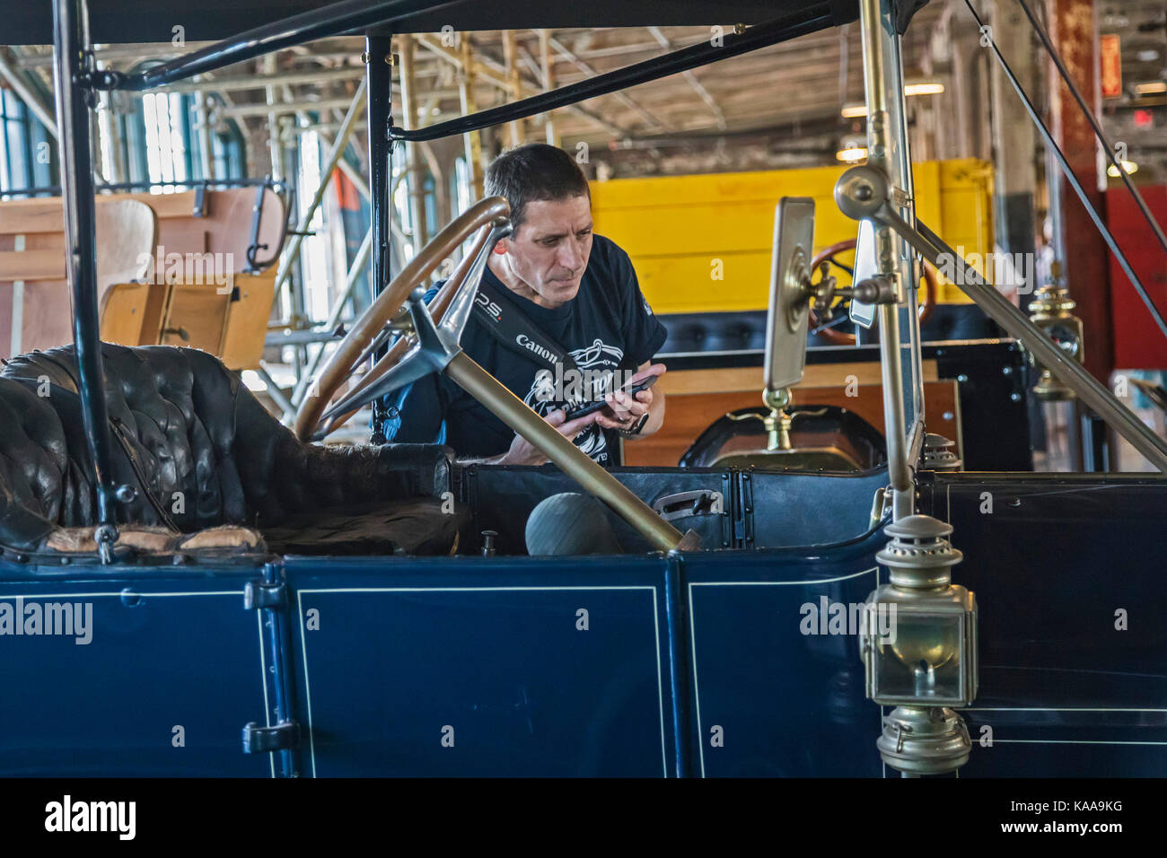 Detroit, Michigan - A visitor looks over a car at the Ford Piquette ...