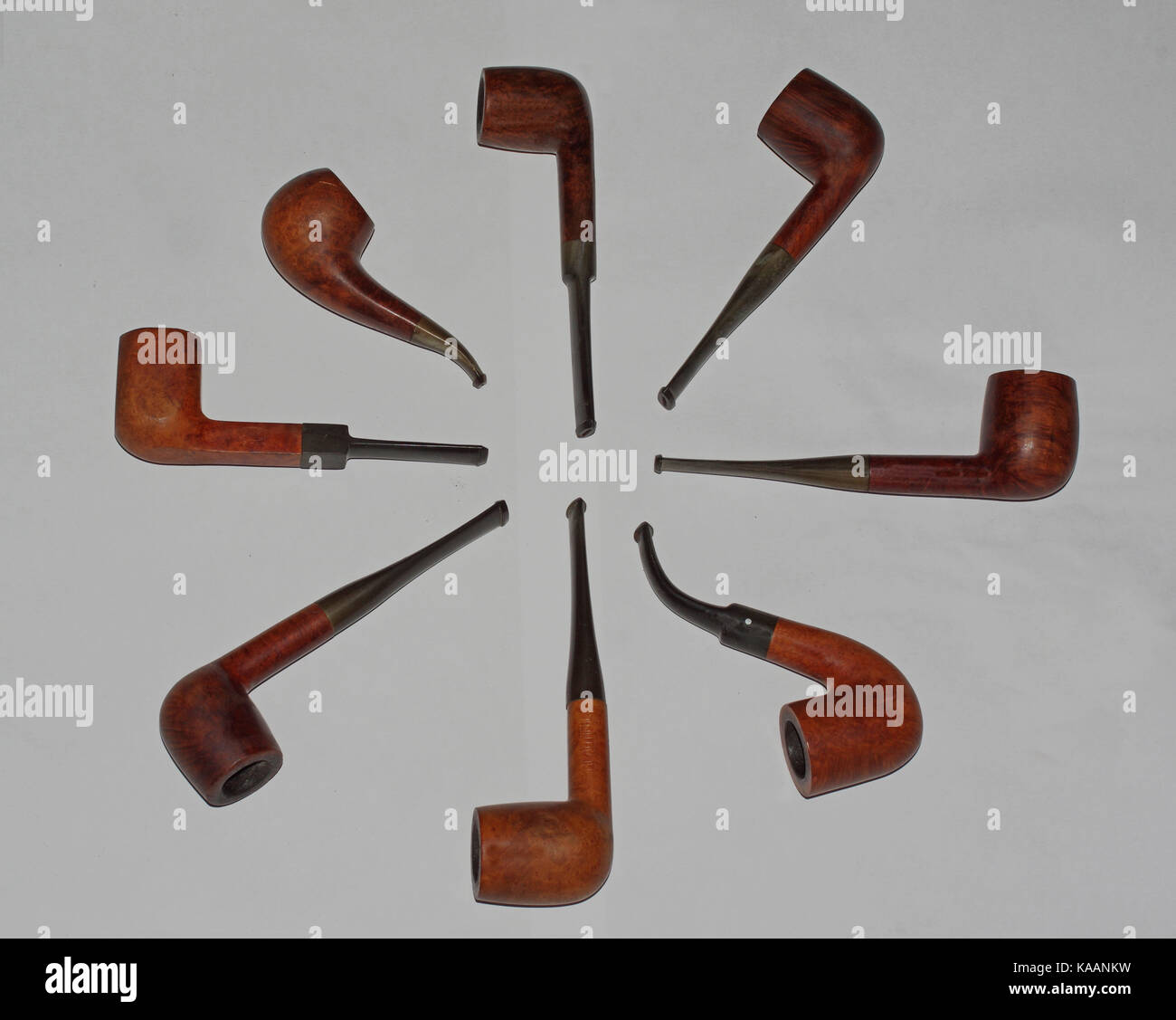 Tobacco pipes close-up on grey background Stock Photo - Alamy