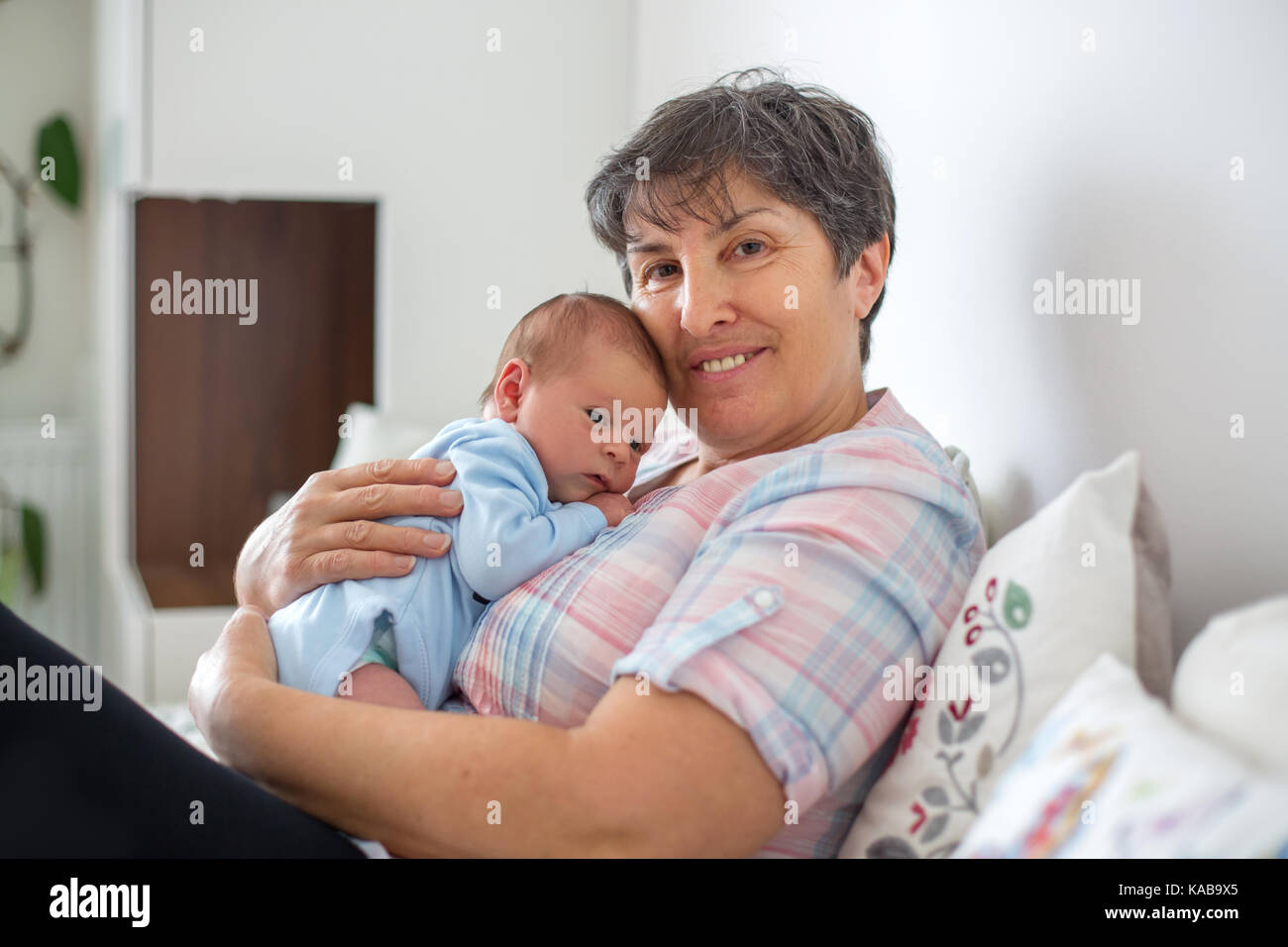 Kissing grandma grandmother child hi-res stock photography and images ...