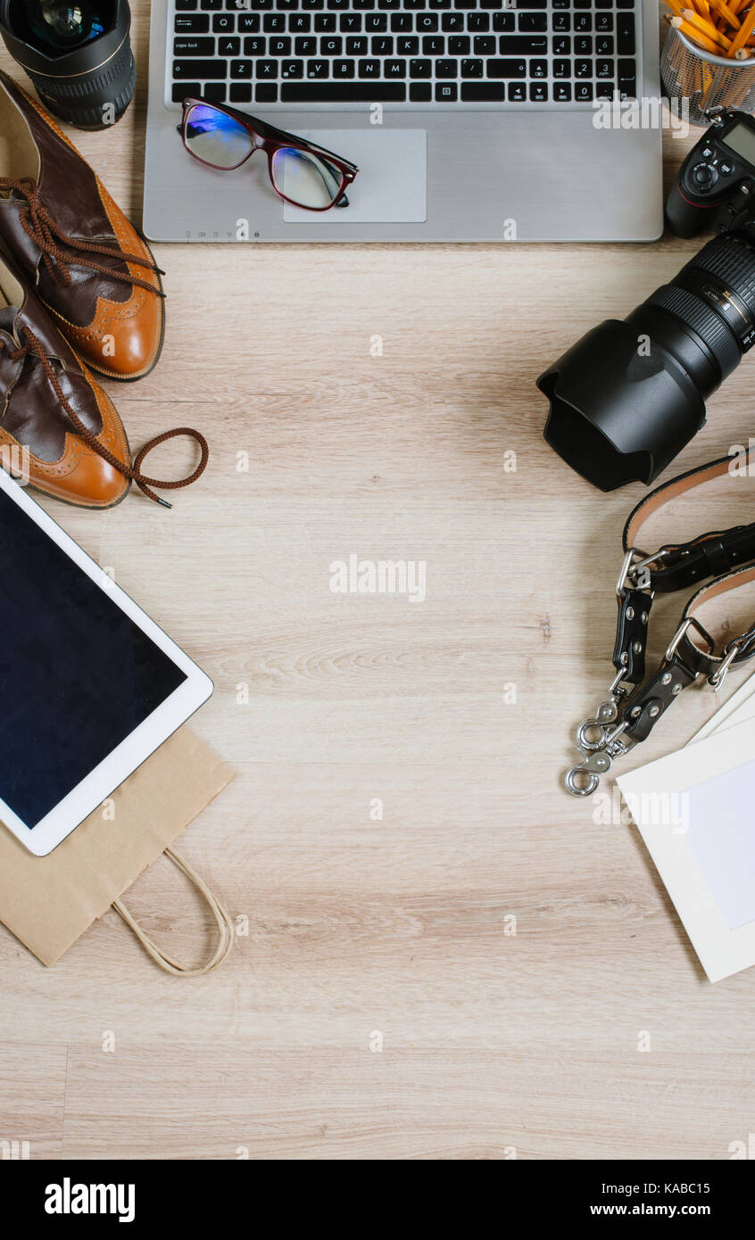 Vertical Photography hipster work table set with computer, tablet, film ...