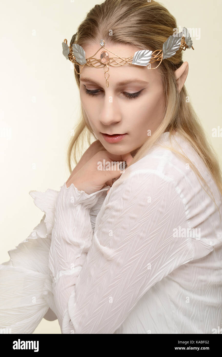 portrait of female elf with gold and silver crown Stock Photo - Alamy