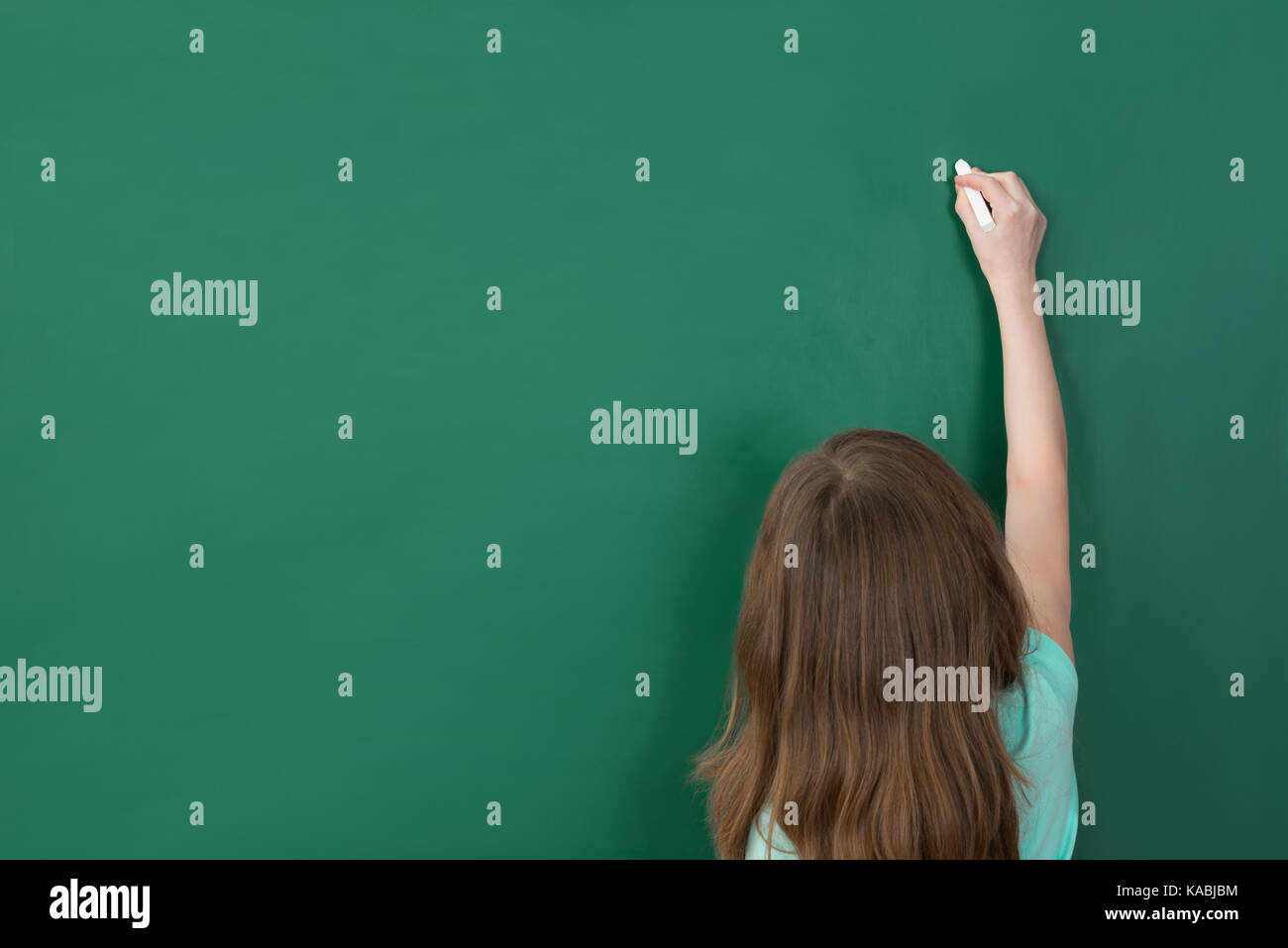 Girl holding chalkboard blackboard hi-res stock photography and images ...