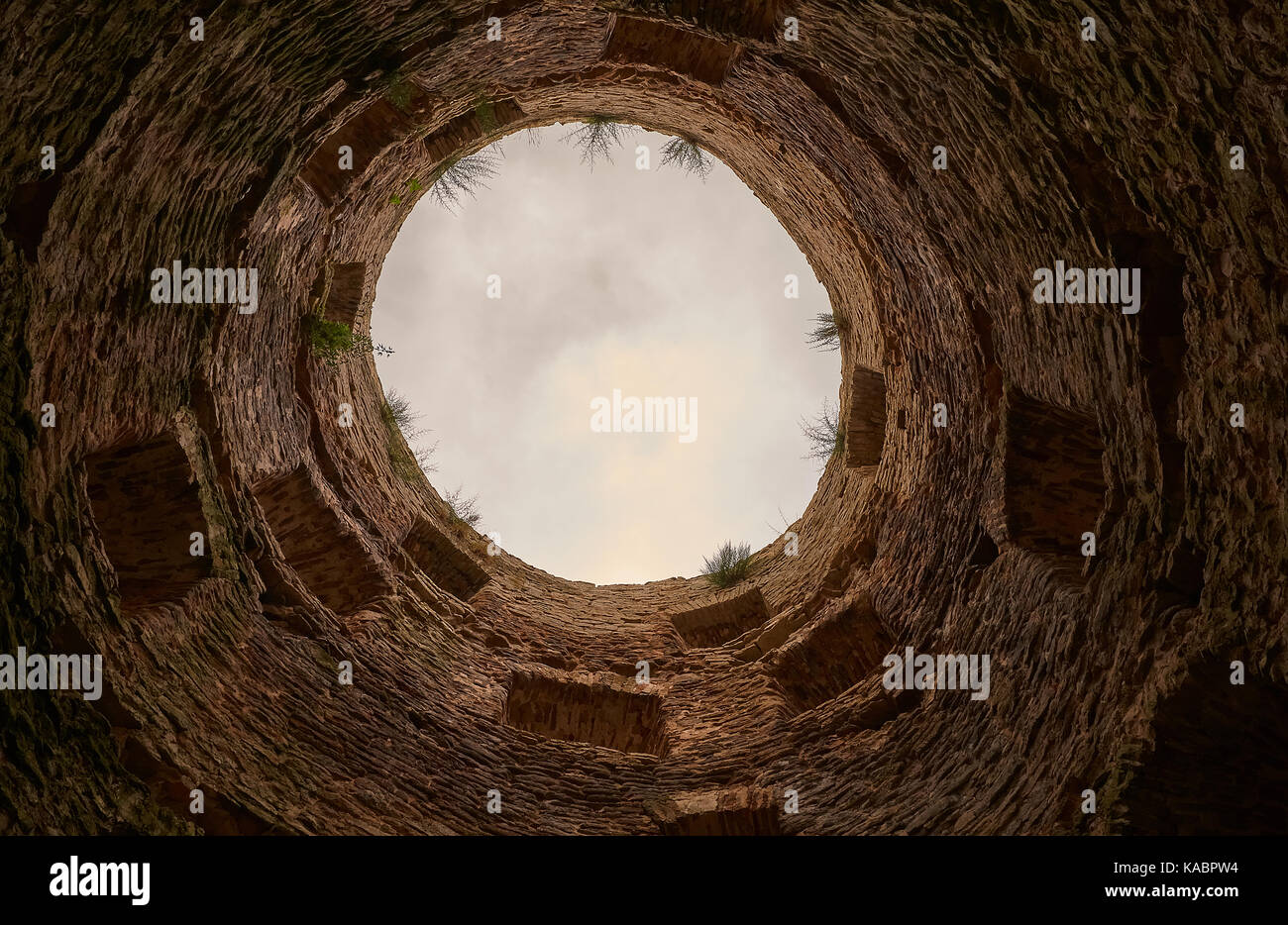 From the floor of the ancient circular watchtower there are walls, sky ...